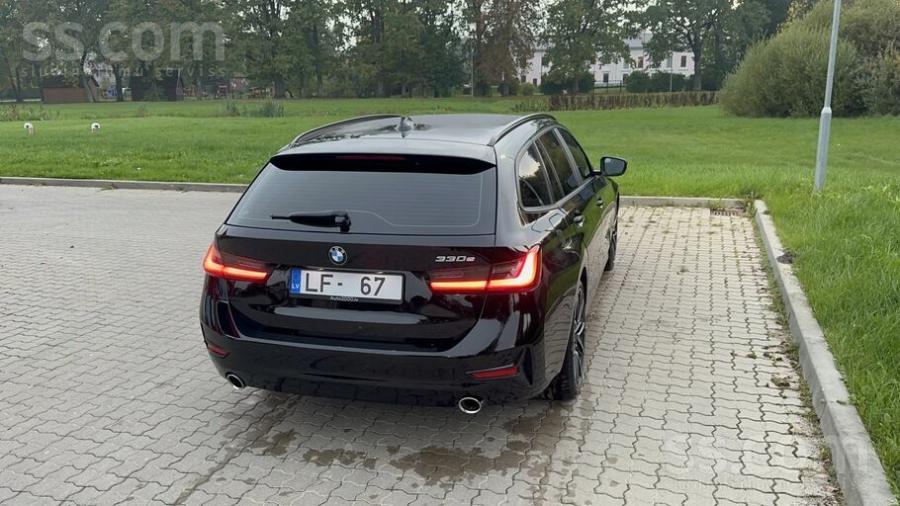 Black BMW 330 2021 in Dobele, with an engine capacity of 2.00 L and mileage of 209 thousand km for 20595 €, photo 12 on AUTOMOTO.COM.LV