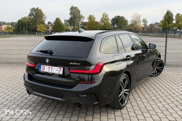 Black BMW 330 2021 in Jelgava, with an engine capacity of 2.00 L and mileage of 196 thousand km for 21750 €, photo 4 on AUTOMOTO.COM.LV