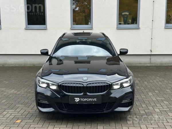 Black BMW 330 2021 in Jelgava, with an engine capacity of 2.00 L and mileage of 181 thousand km for 22500 €, photo 3 on AUTOMOTO.COM.LV