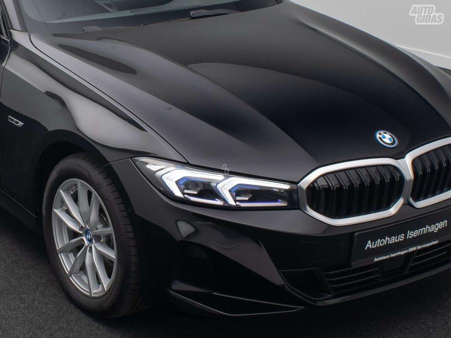 Black BMW 330 2022 in Kaunas, with an engine capacity of 2.00 L and mileage of 55 thousand km for 31669 €, photo 19 on AUTOMOTO.COM.LV