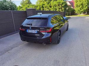 Black BMW 330 2023 in Kaunas, with an engine capacity of 2.00 L and mileage of 52 thousand km for 12900 €, photo 6 on AUTOMOTO.COM.LV