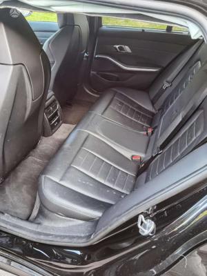 Black BMW 330 2023 in Kaunas, with an engine capacity of 2.00 L and mileage of 52 thousand km for 12900 €, photo 23 on AUTOMOTO.COM.LV