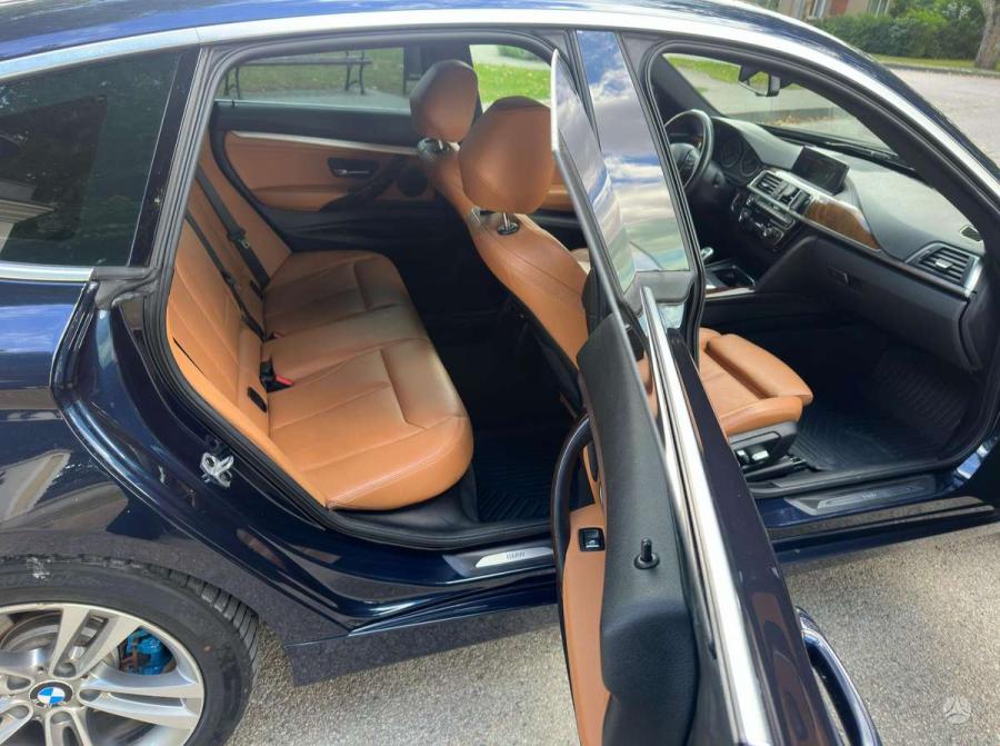 Blue BMW 330 2018 in Vilkaviskis, with an engine capacity of 2.00 L and mileage of 131 thousand km for 18300 €, photo 9 on AUTOMOTO.COM.LV