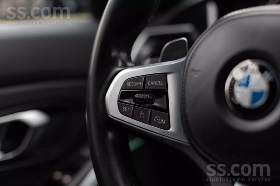 Blue BMW 330 2019 in Riga, with an engine capacity of 3.00 L and mileage of 195 thousand km for 23999 €, photo 12 on AUTOMOTO.COM.LV