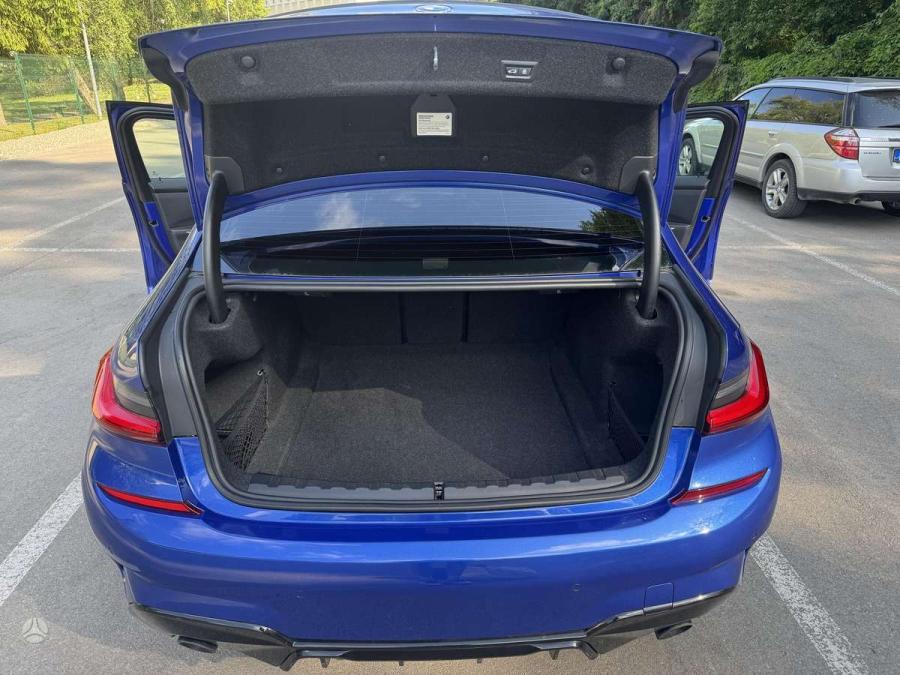 Blue BMW 330 2021 in Elektrenai, with an engine capacity of 2.00 L and mileage of 56 thousand km for 24999 €, photo 13 on AUTOMOTO.COM.LV