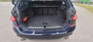 Blue BMW 330 2019 in Valmiera, with an engine capacity of 3.00 L and mileage of 184 thousand km for 26000 €, photo 7 on AUTOMOTO.COM.LV