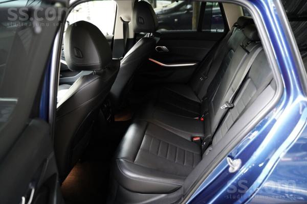 Blue BMW 330 2022 in Riga, with an engine capacity of 2.00 L and mileage of 194 thousand km for 21990 €, photo 10 on AUTOMOTO.COM.LV