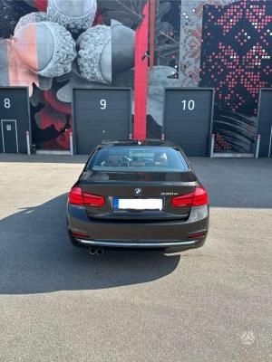 Brown BMW 330 2017 in Vilnius, with an engine capacity of 2.00 L and mileage of 223 thousand km for 13900 €, photo 7 on AUTOMOTO.COM.LV