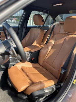 Brown BMW 330 2017 in Vilnius, with an engine capacity of 2.00 L and mileage of 223 thousand km for 13900 €, photo 12 on AUTOMOTO.COM.LV