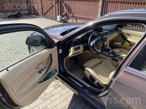 Brown BMW 330 2014 in Riga, with an engine capacity of 3.00 L and mileage of 218 thousand km for 12800 €, photo 8 on AUTOMOTO.COM.LV