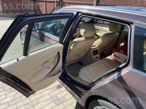 Brown BMW 330 2014 in Riga, with an engine capacity of 3.00 L and mileage of 218 thousand km for 12800 €, photo 11 on AUTOMOTO.COM.LV