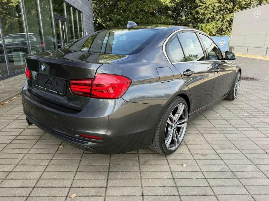 Grey BMW 330 2016 in Kaunas, with an engine capacity of 2.00 L and mileage of 238 thousand km for 11500 €, photo 4 on AUTOMOTO.COM.LV