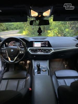 Grey BMW 330 2019 in Vilnius, with an engine capacity of 2.00 L and mileage of 110 thousand km for 24600 €, photo 13 on AUTOMOTO.COM.LV