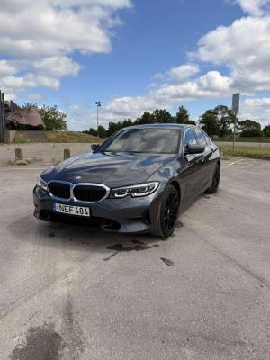 Grey BMW 330 2022 in Siauliai, with an engine capacity of 2.00 L and mileage of 67 thousand km for 24999 €, photo  on AUTOMOTO.COM.LV
