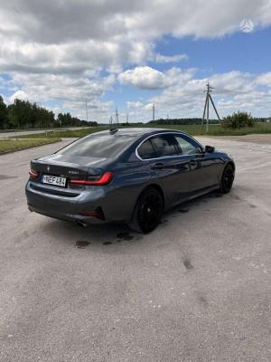 Grey BMW 330 2022 in Siauliai, with an engine capacity of 2.00 L and mileage of 67 thousand km for 24999 €, photo 4 on AUTOMOTO.COM.LV