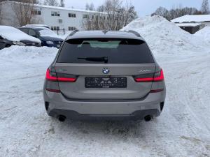 Grey BMW 330 2021 in Birzai, with an engine capacity of 2.00 L and mileage of 80 thousand km for 23900 €, photo 6 on AUTOMOTO.COM.LV