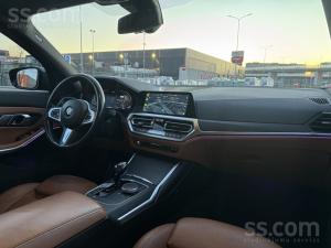 Grey BMW 330 2021 in Riga, with an engine capacity of 3.00 L and mileage of 248 thousand km for 23500 €, photo 11 on AUTOMOTO.COM.LV