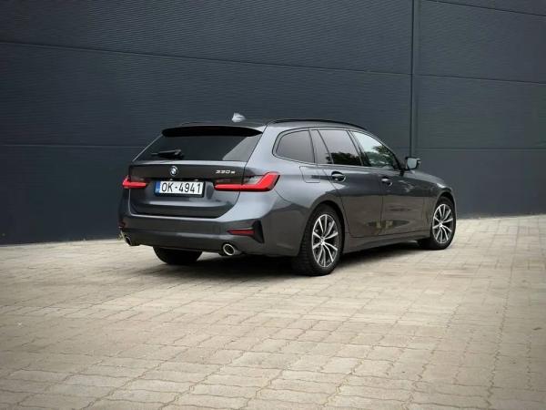 Grey BMW 330 2021 in Riga, with an engine capacity of 2.00 L and mileage of 154 thousand km for 22495 €, photo 6 on AUTOMOTO.COM.LV