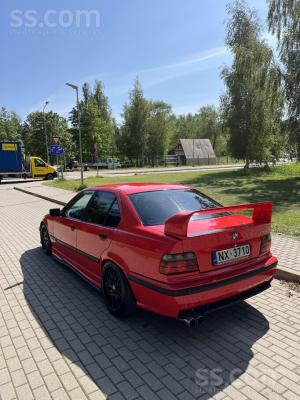 Red BMW 330 1995 in Liepaja, with an engine capacity of 3.00 L and mileage of 440 thousand km for 2250 €, photo 2 on AUTOMOTO.COM.LV