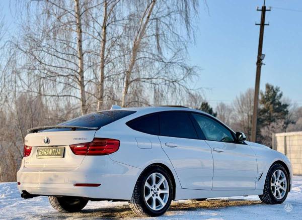 White BMW 330 2014 in Siauliai, with an engine capacity of 2.99 L and mileage of 244 thousand km for 13550 €, photo 4 on AUTOMOTO.COM.LV