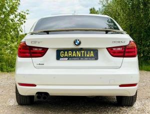 White BMW 330 2014 in Siauliai, with an engine capacity of 2.99 L and mileage of 244 thousand km for 13550 €, photo 7 on AUTOMOTO.COM.LV