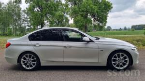 White BMW 330 2012 in Ogre, with an engine capacity of 3.00 L and mileage of 311 thousand km for 14000 €, photo 5 on AUTOMOTO.COM.LV