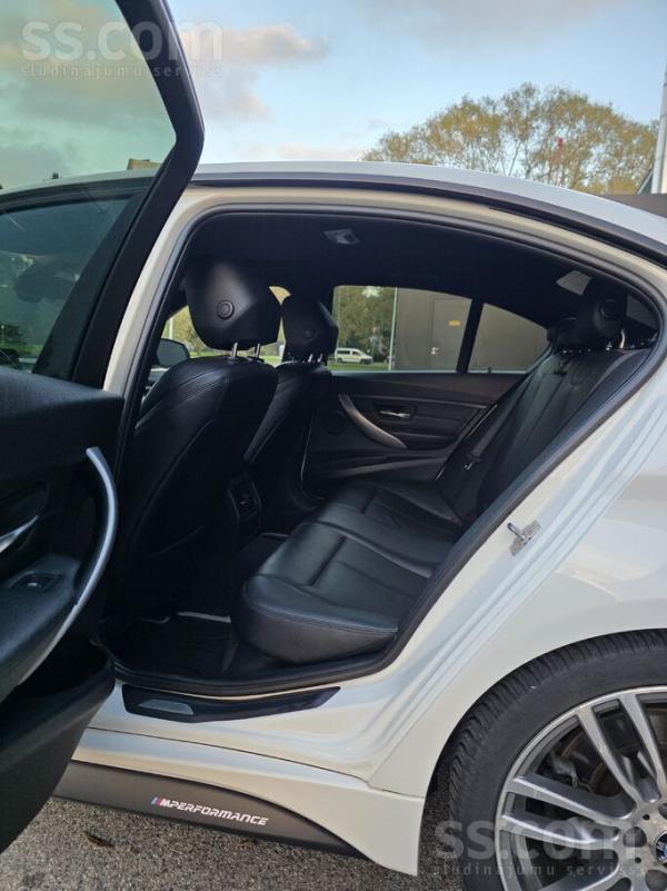 White BMW 330 2013 in Riga, with an engine capacity of 3.00 L and mileage of 243 thousand km for 15200 €, photo 10 on AUTOMOTO.COM.LV