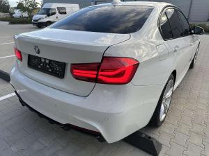 White BMW 330 2017 in Vilnius, with an engine capacity of 2.00 L and mileage of 176 thousand km for 14700 €, photo 6 on AUTOMOTO.COM.LV
