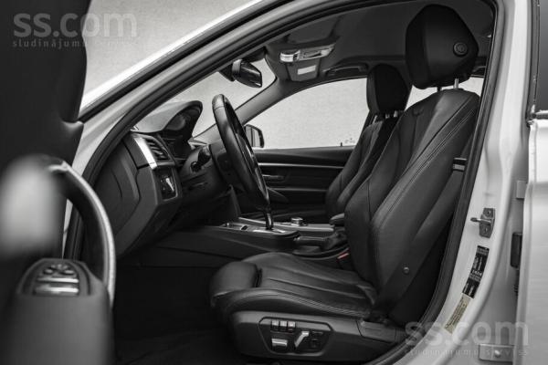 White BMW 330 2018 in Riga, with an engine capacity of 3.00 L and mileage of 237 thousand km for 17990 €, photo 8 on AUTOMOTO.COM.LV