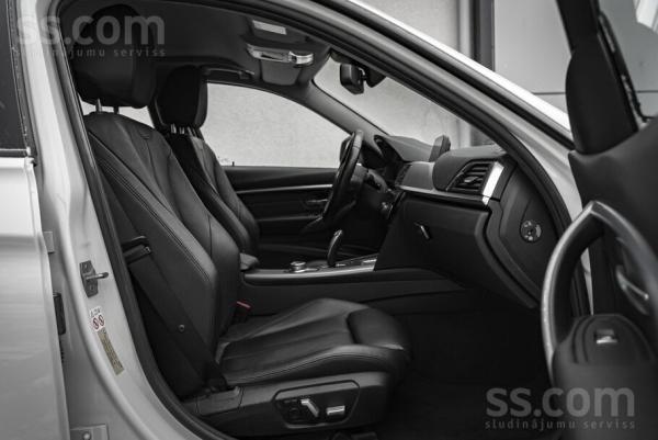 White BMW 330 2018 in Riga, with an engine capacity of 3.00 L and mileage of 237 thousand km for 17990 €, photo 10 on AUTOMOTO.COM.LV