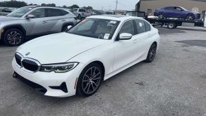 White BMW 330 2020 in Ukmerge, with an engine capacity of 2.00 L and mileage of 301 thousand km for 13100 €, photo 3 on AUTOMOTO.COM.LV