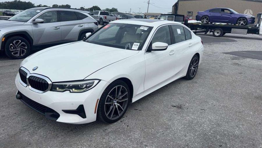 White BMW 330 2020 in Ukmerge, with an engine capacity of 2.00 L and mileage of 301 thousand km for 13100 €, photo 3 on AUTOMOTO.COM.LV