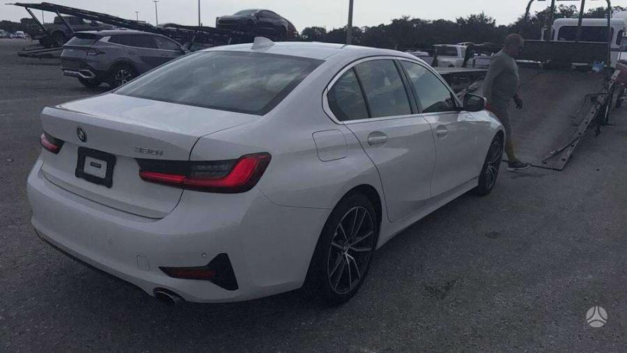 White BMW 330 2020 in Ukmerge, with an engine capacity of 2.00 L and mileage of 301 thousand km for 13100 €, photo 5 on AUTOMOTO.COM.LV