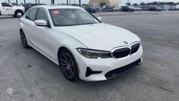 White BMW 330 2020 in Ukmerge, with an engine capacity of 2.00 L and mileage of 301 thousand km for 12500 €, photo 3 on AUTOMOTO.COM.LV