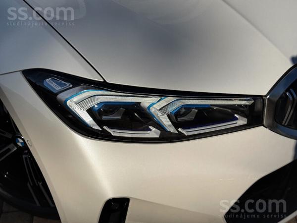 White BMW 330 2023 in Riga, with an engine capacity of 3.00 L and mileage of 172 thousand km for 29800 €, photo 10 on AUTOMOTO.COM.LV