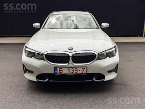 White BMW 330 2021 in Jelgava, with an engine capacity of 2.00 L and mileage of 239 thousand km for 17900 €, photo 4 on AUTOMOTO.COM.LV