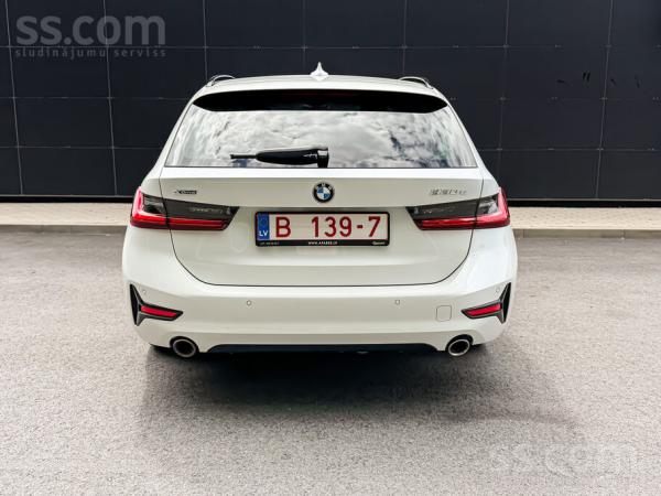 White BMW 330 2021 in Jelgava, with an engine capacity of 2.00 L and mileage of 239 thousand km for 17900 €, photo 4 on AUTOMOTO.COM.LV