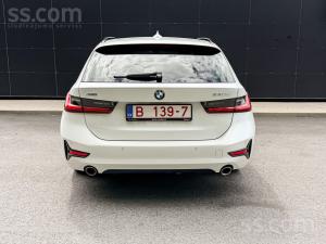 White BMW 330 2021 in Jelgava, with an engine capacity of 2.00 L and mileage of 239 thousand km for 17900 €, photo 5 on AUTOMOTO.COM.LV