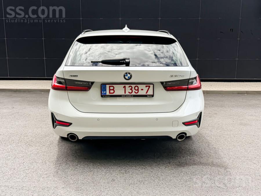 White BMW 330 2021 in Jelgava, with an engine capacity of 2.00 L and mileage of 239 thousand km for 17900 €, photo 5 on AUTOMOTO.COM.LV