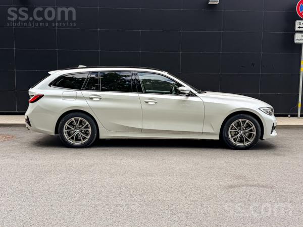 White BMW 330 2021 in Jelgava, with an engine capacity of 2.00 L and mileage of 239 thousand km for 17900 €, photo 5 on AUTOMOTO.COM.LV