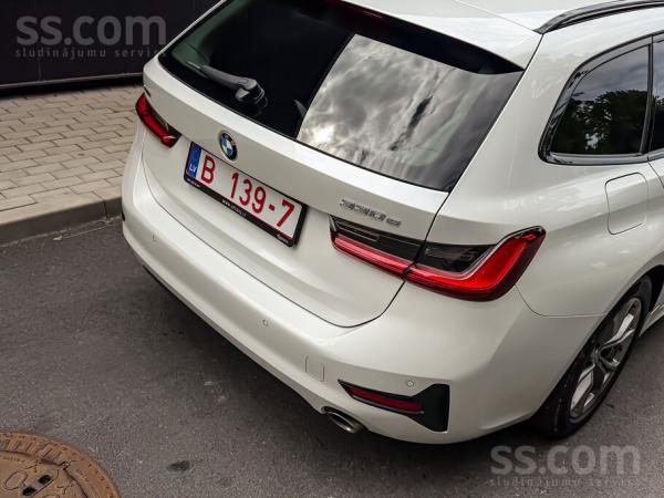 White BMW 330 2021 in Jelgava, with an engine capacity of 2.00 L and mileage of 239 thousand km for 17900 €, photo 6 on AUTOMOTO.COM.LV
