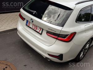 White BMW 330 2021 in Jelgava, with an engine capacity of 2.00 L and mileage of 239 thousand km for 17900 €, photo 7 on AUTOMOTO.COM.LV