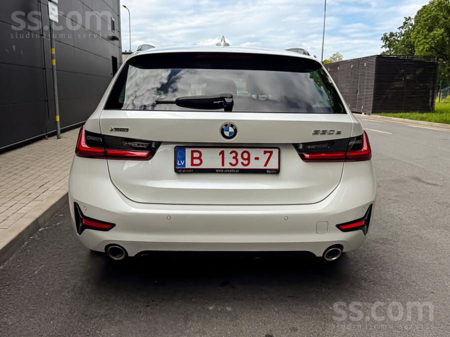 White BMW 330 2021 in Jelgava, with an engine capacity of 2.00 L and mileage of 239 thousand km for 17900 €, photo 12 on AUTOMOTO.COM.LV