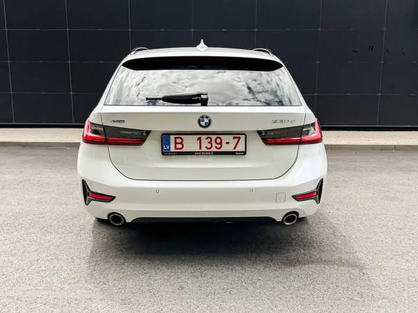 White BMW 330 2021 in Jelgava, with an engine capacity of 2.00 L and mileage of 239 thousand km for 17900 €, photo 4 on AUTOMOTO.COM.LV