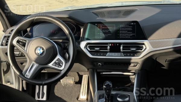 White BMW 330 2021 in Riga, with an engine capacity of 3.00 L and mileage of 163 thousand km for 28900 €, photo 7 on AUTOMOTO.COM.LV