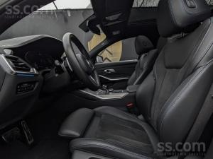 White BMW 330 2022 in Tukums, with an engine capacity of 2.00 L and mileage of 186 thousand km for 24990 €, photo 7 on AUTOMOTO.COM.LV