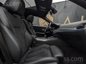 White BMW 330 2022 in Tukums, with an engine capacity of 2.00 L and mileage of 186 thousand km for 24990 €, photo 8 on AUTOMOTO.COM.LV