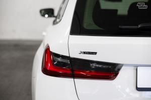 White BMW 330 2022 in Vilnius, with an engine capacity of 2.00 L and mileage of 108 thousand km for 28771 €, photo 13 on AUTOMOTO.COM.LV