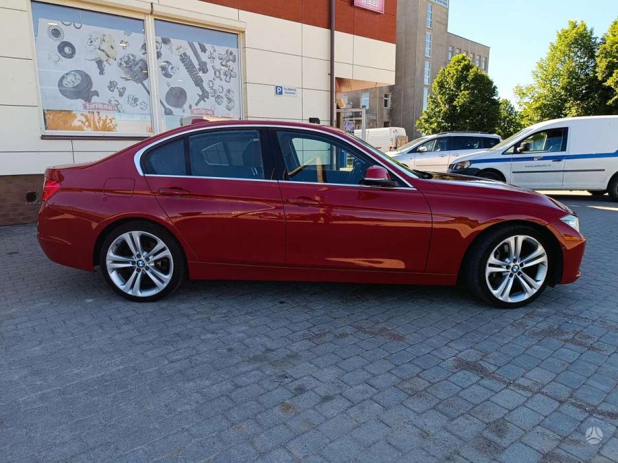 Red BMW 335 2013 in Kretinga, with an engine capacity of 2.98 L and mileage of 217 thousand km for 12200 €, photo 4 on AUTOMOTO.COM.LV