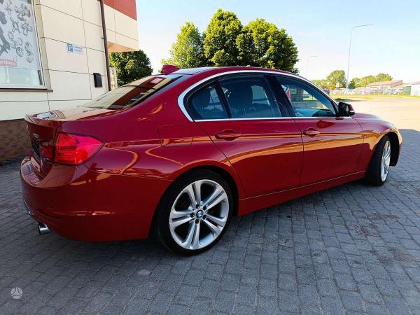 Red BMW 335 2013 in Kretinga, with an engine capacity of 2.98 L and mileage of 217 thousand km for 12200 €, photo 4 on AUTOMOTO.COM.LV